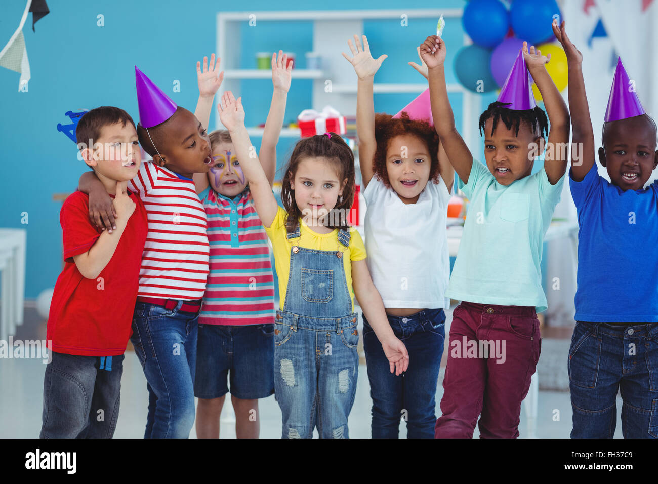 Happy kids enjoying a birthday party Stock Photo - Alamy