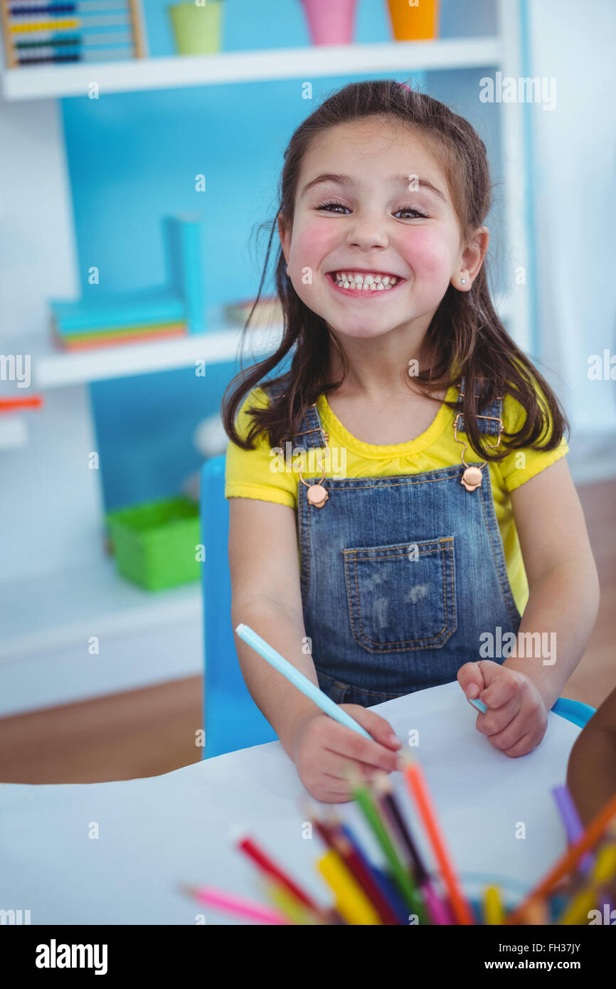 Happy kids enjoying arts and crafts together Stock Photo - Alamy
