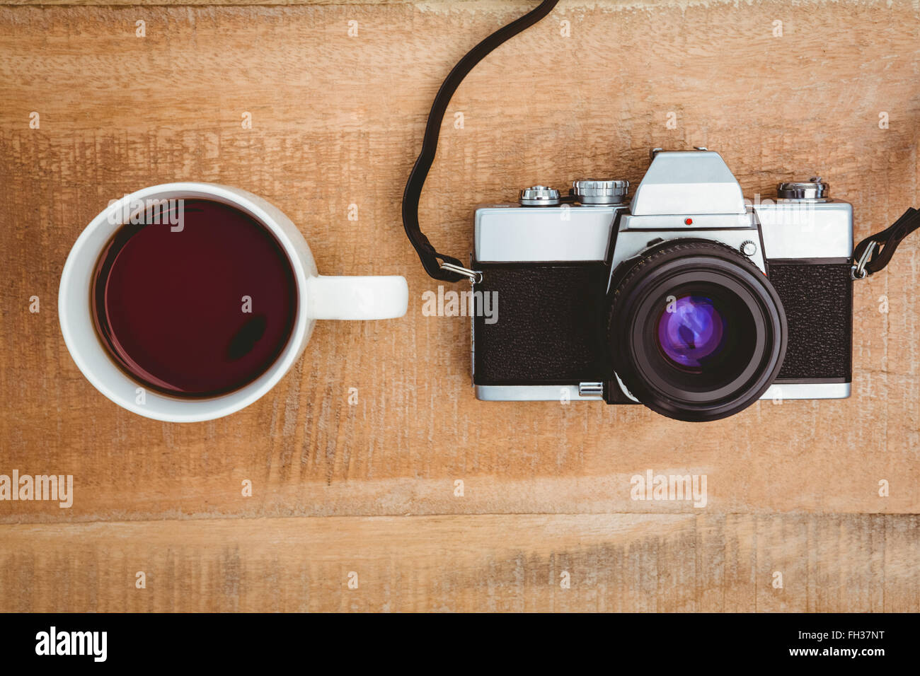 View of an old camera and a coffee Stock Photo - Alamy