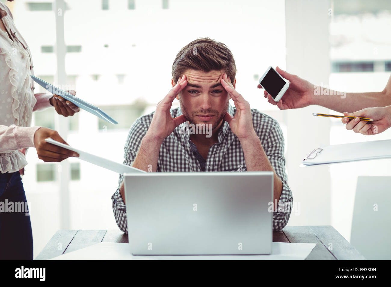 Businessman stressed out at work Stock Photo - Alamy