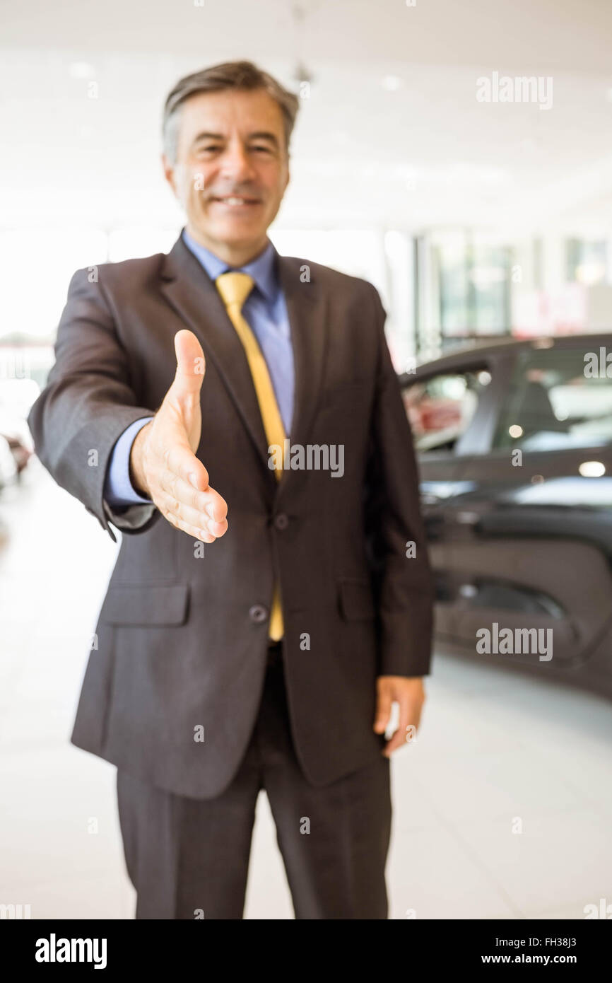 Businessman ready to shake hand Stock Photo - Alamy