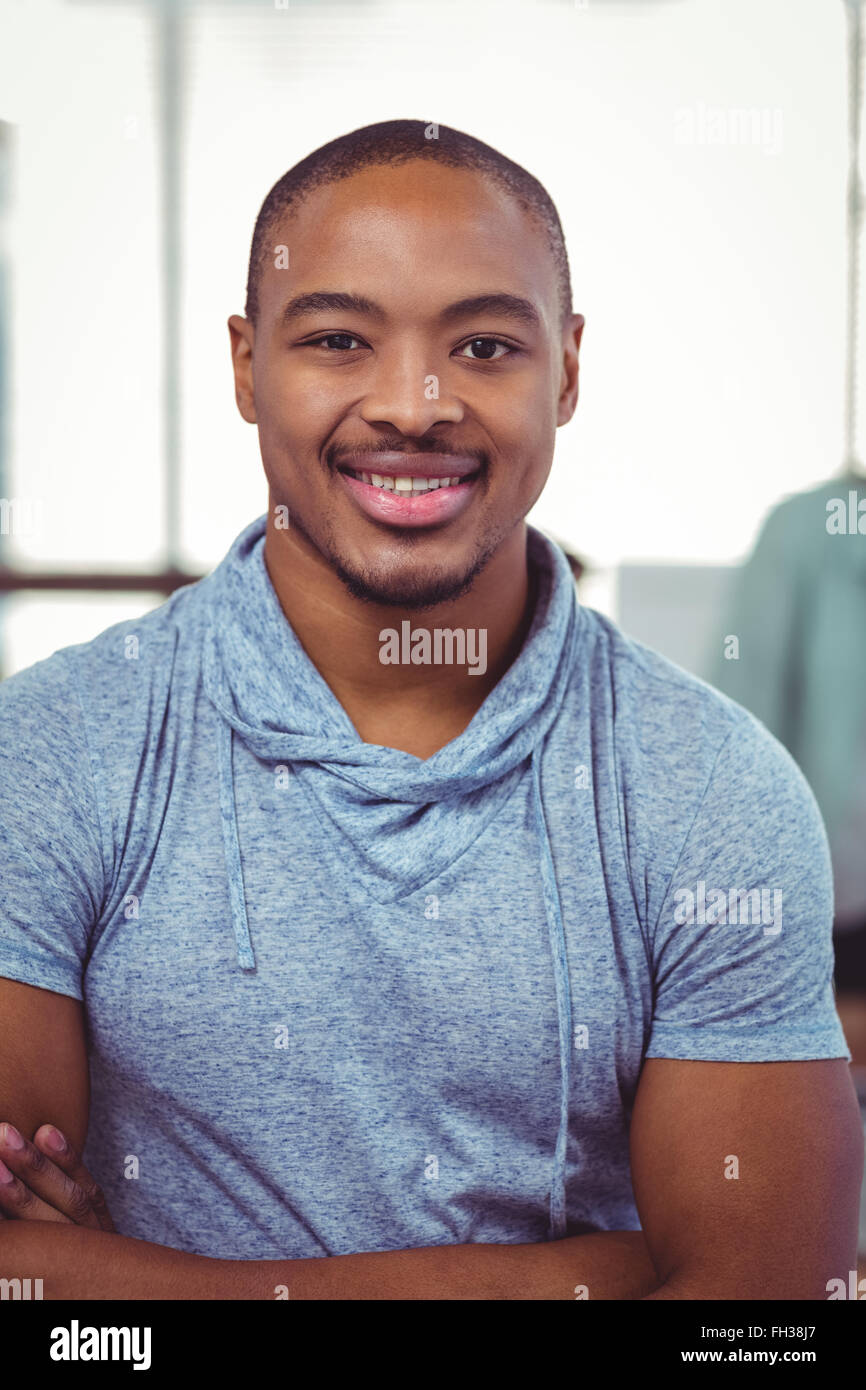 Young creative worker smiling at camera Stock Photo - Alamy