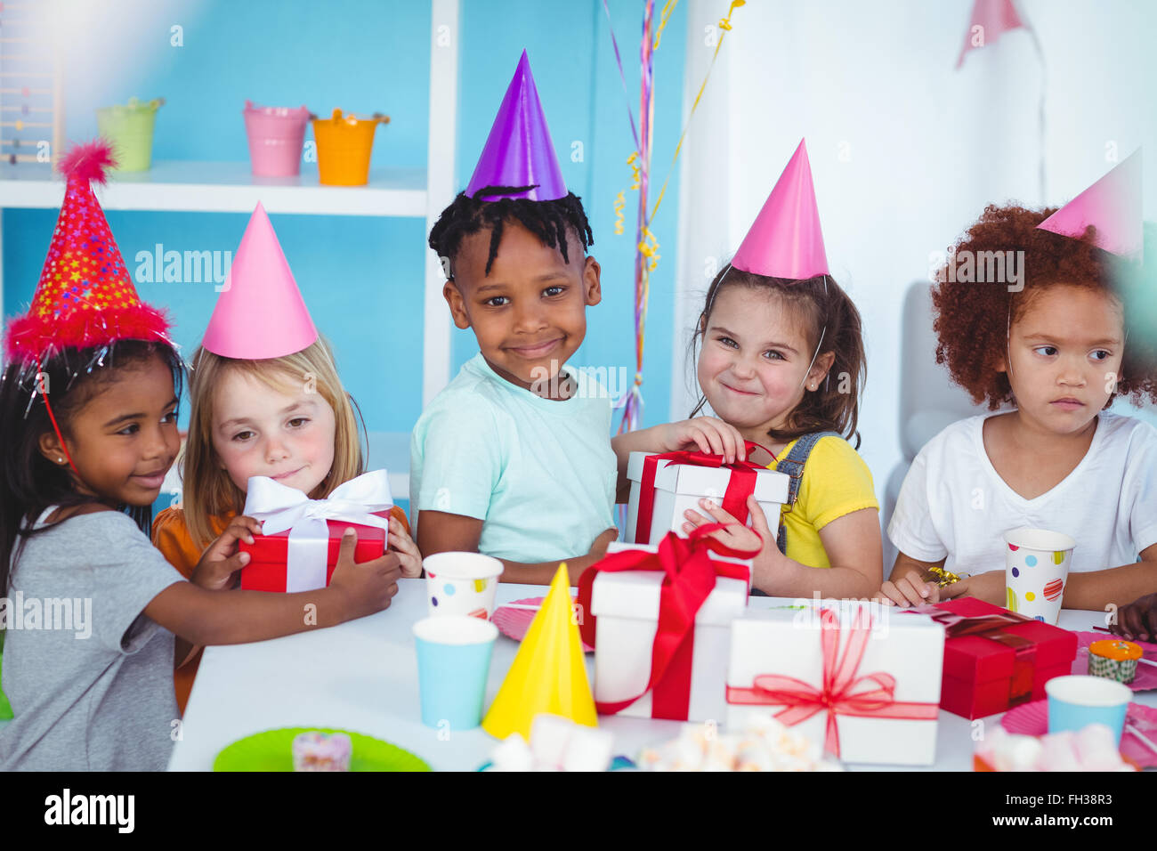 Happy kids at a birthday party Stock Photo - Alamy