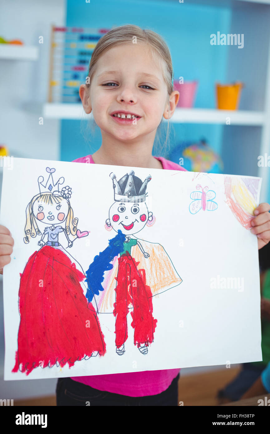 Small girl holding a lovely drawing Stock Photo - Alamy