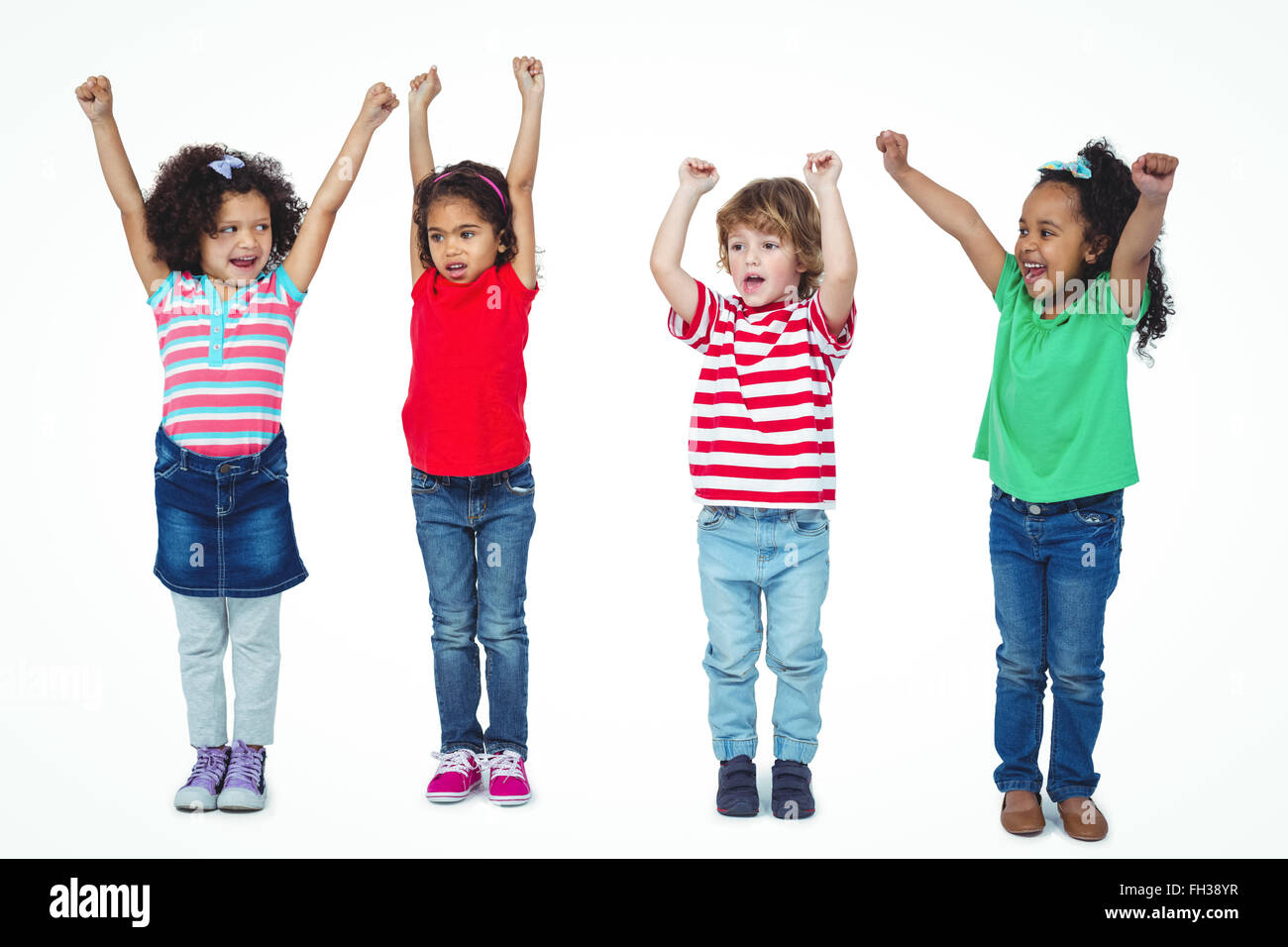 Happy kids arms raised together hi-res stock photography and images - Alamy