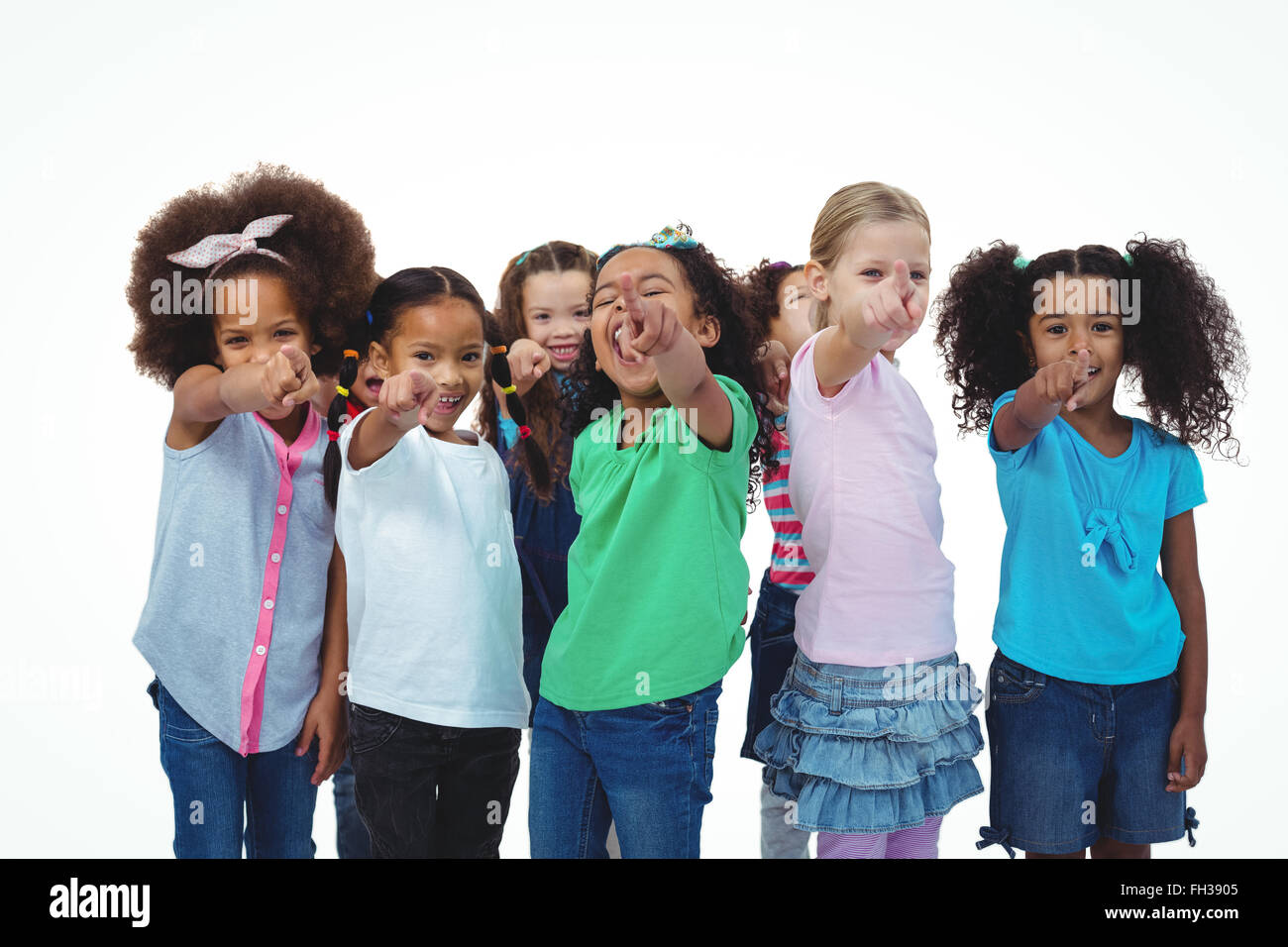 Line of girls standing with hands pointing ahead Stock Photo - Alamy