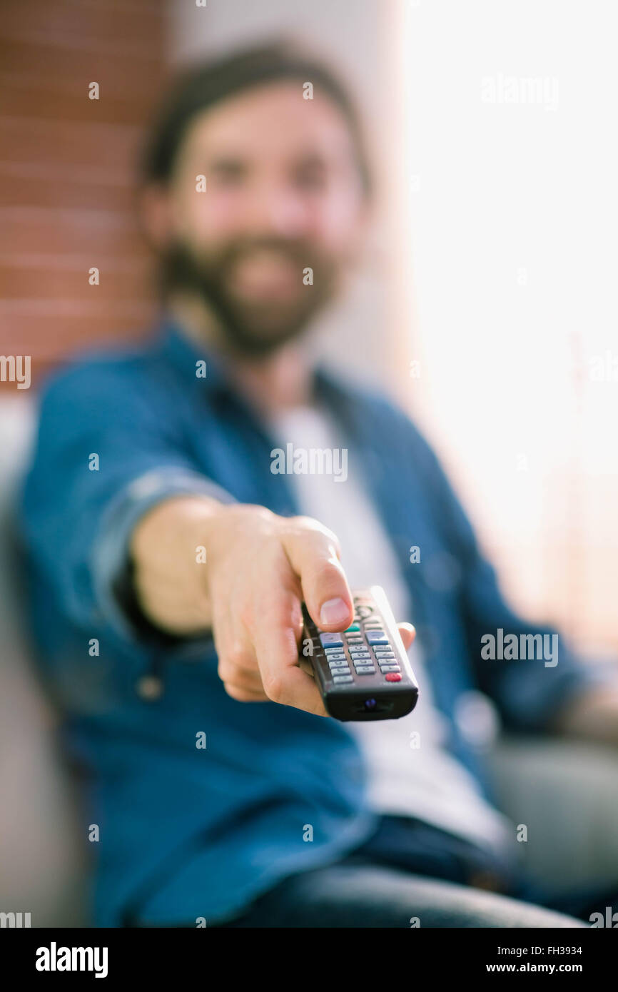 Man watching tv on hi-res stock photography and images - Alamy
