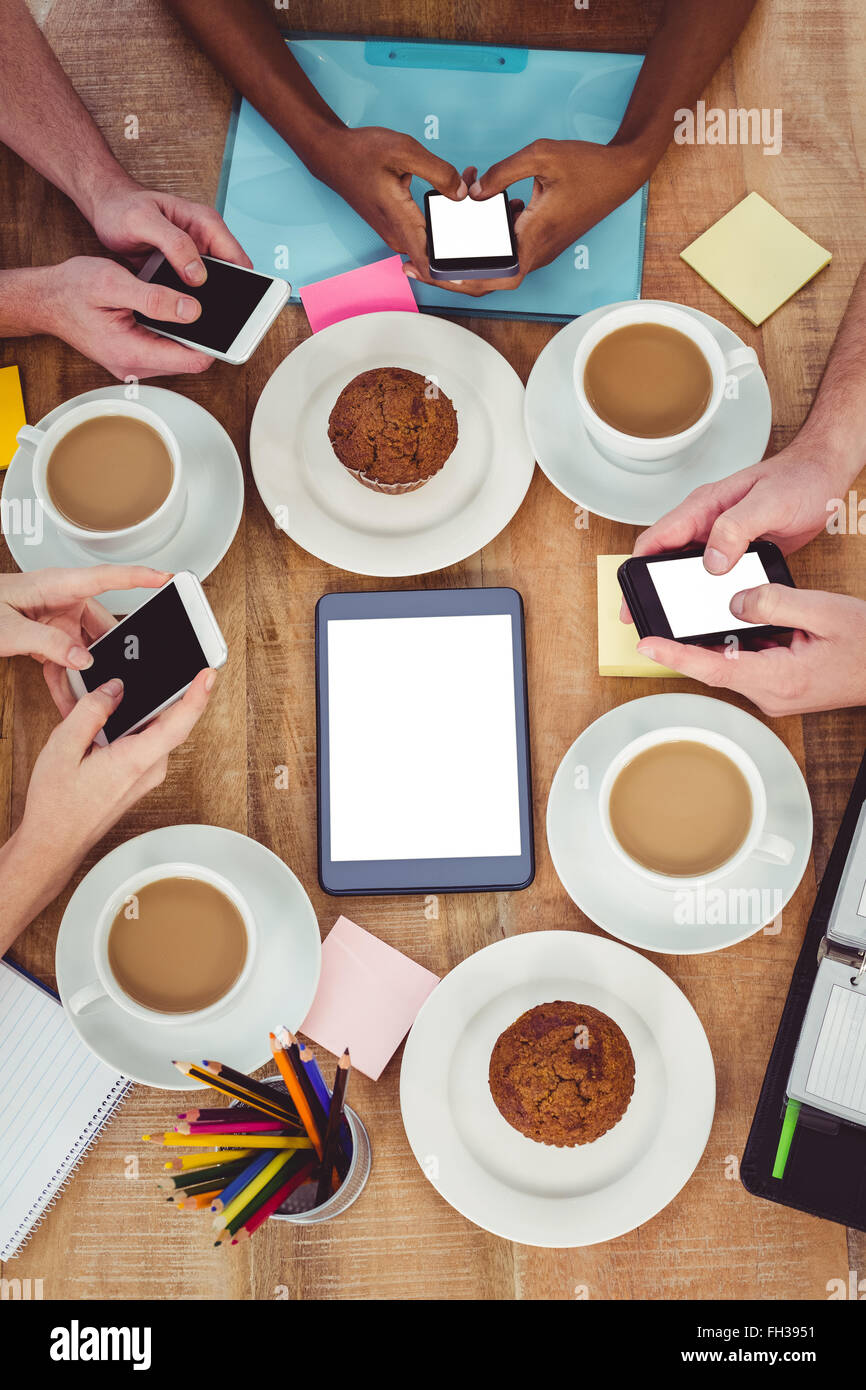 Creative team working together on a tablets and smartphones Stock Photo ...