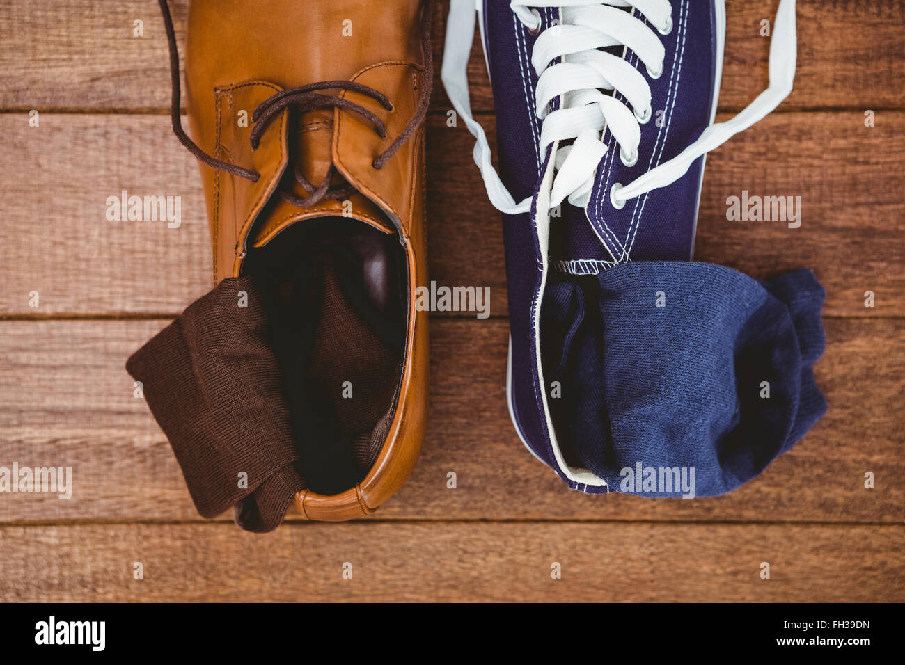 View of two different shoes Stock Photo - Alamy