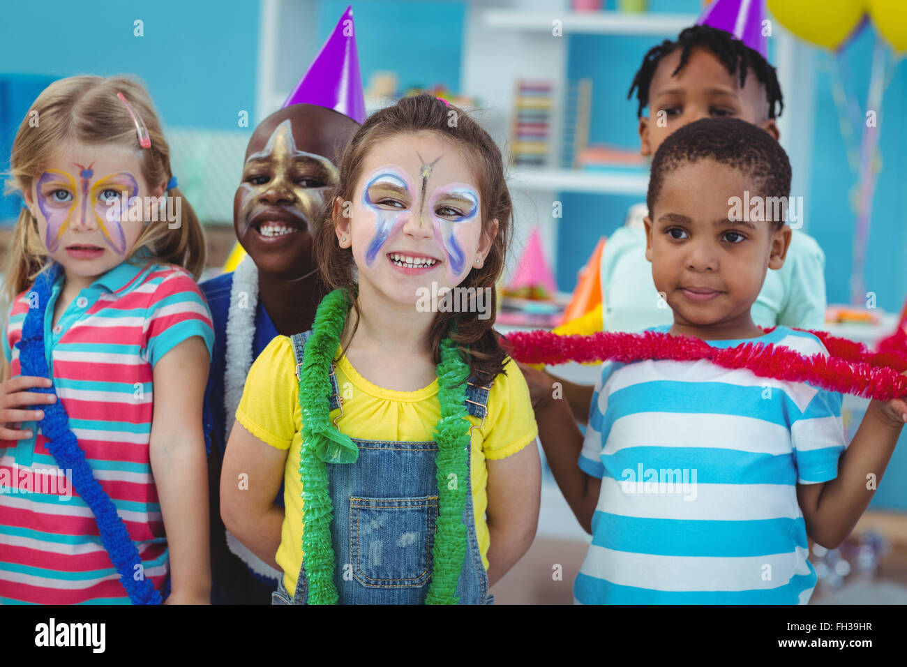 Happy kids enjoying a birthday party Stock Photo - Alamy