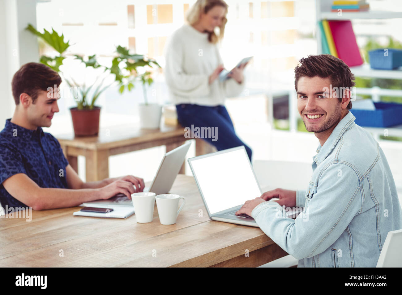 Creative businessteam working with mobile computers Stock Photo - Alamy