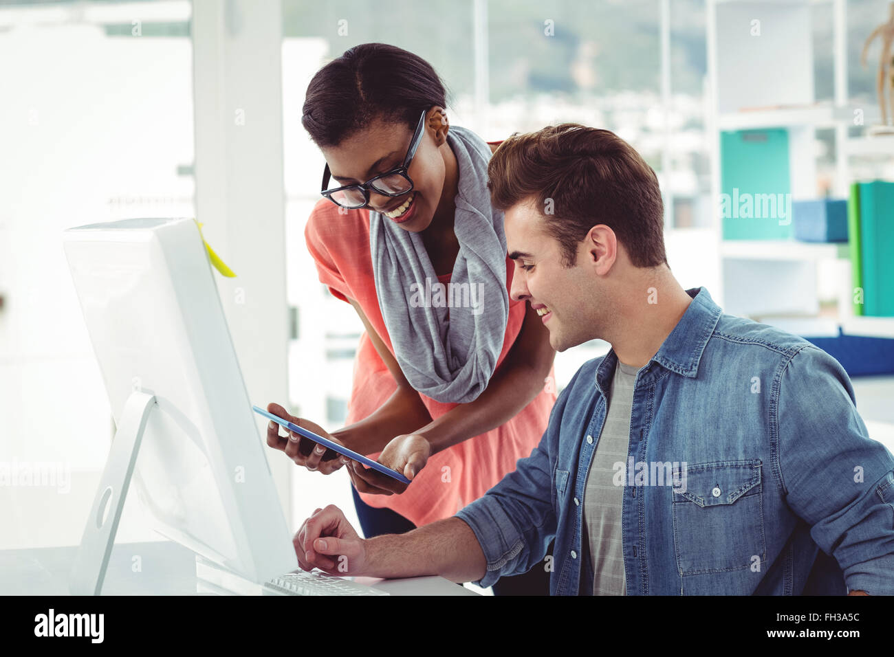 Creative business team working hard together Stock Photo - Alamy