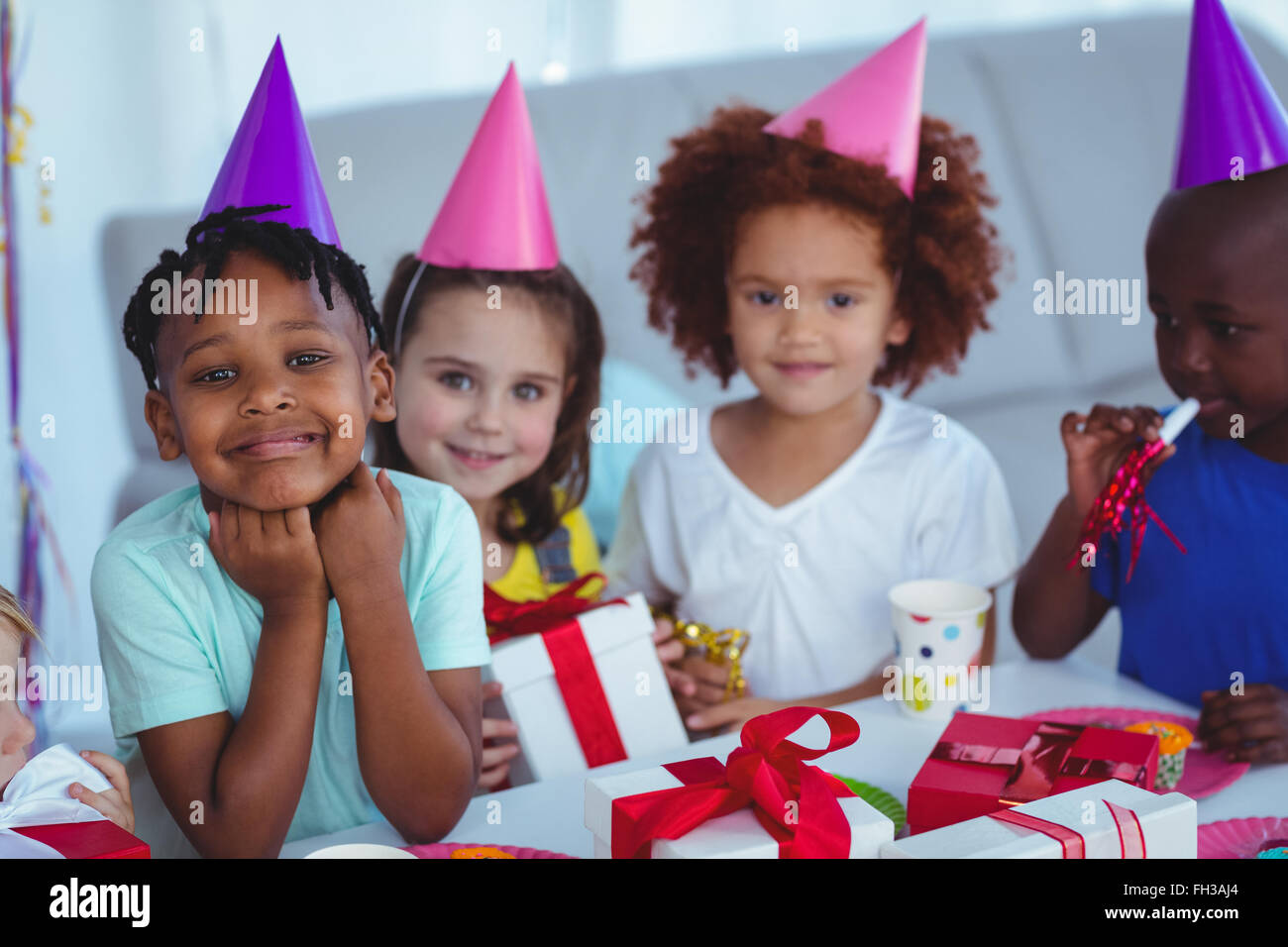 Happy kids at a birthday party Stock Photo - Alamy