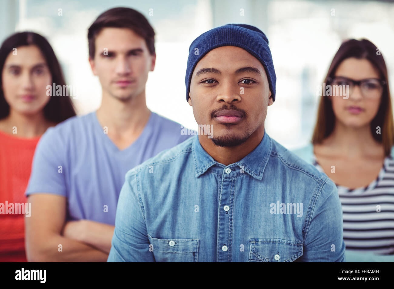 Serious creative team looking camera hi-res stock photography and ...
