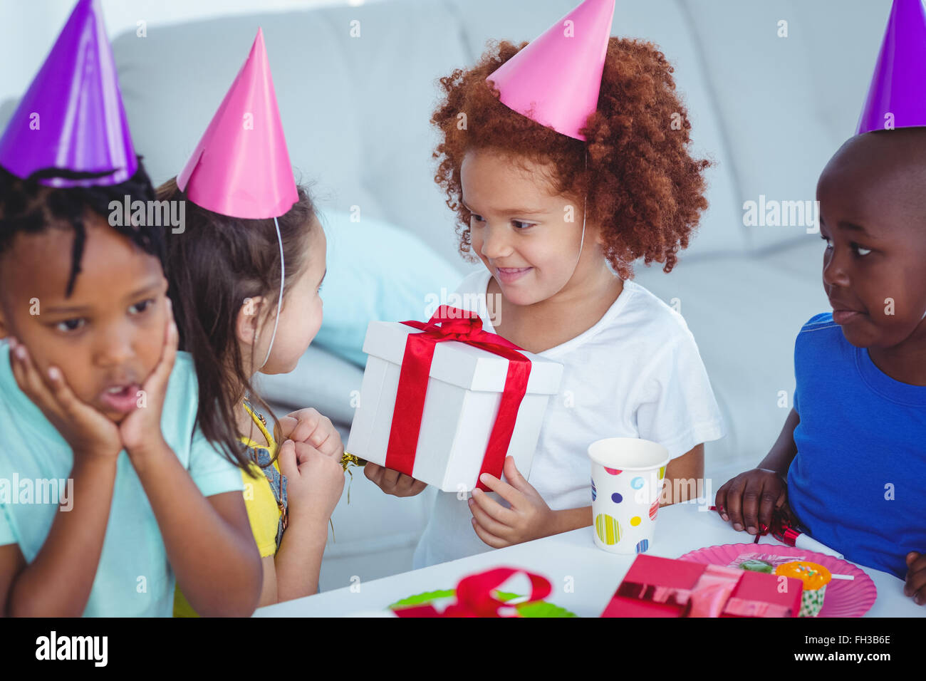 Happy kids at a birthday party Stock Photo - Alamy