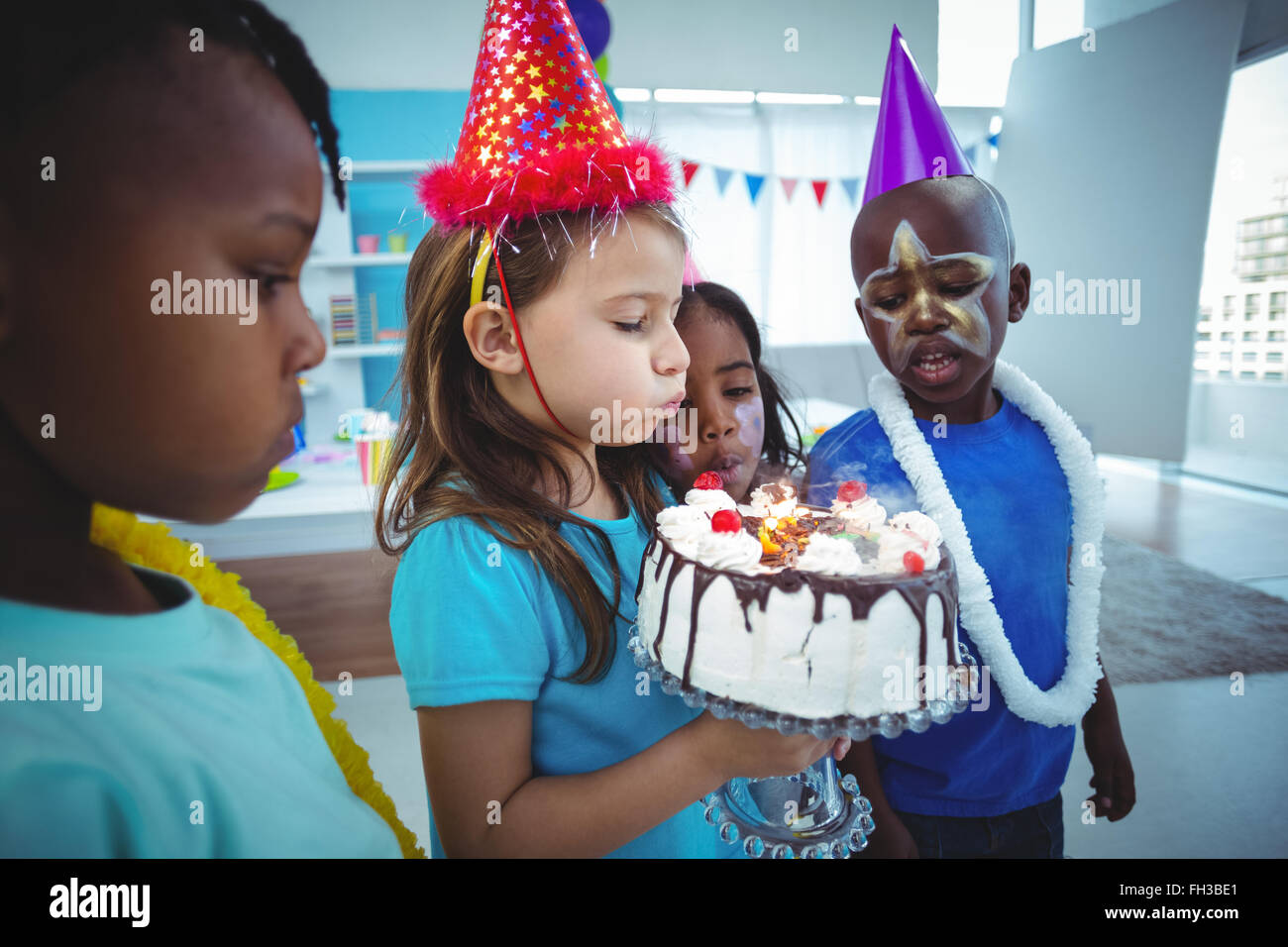 Happy kids gathered together Stock Photo - Alamy