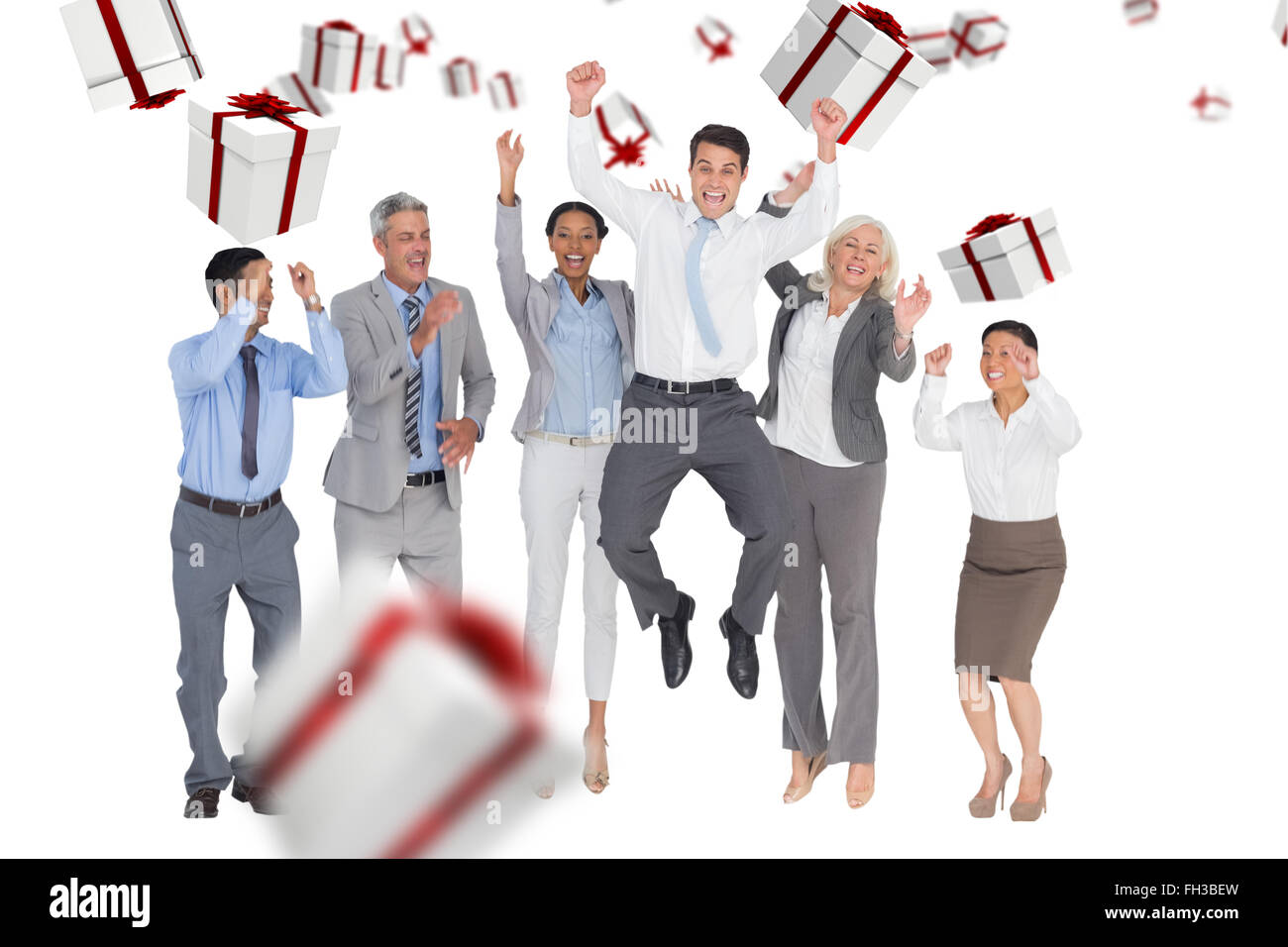 Composite image of business people cheering in office Stock Photo - Alamy