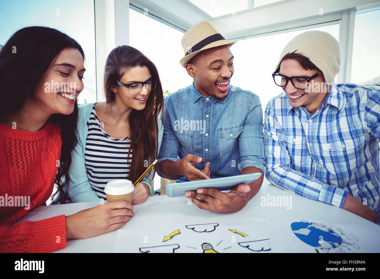 Young creative team having a meeting Stock Photo - Alamy