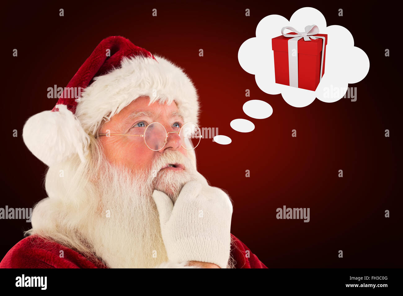 Composite image of santa is thinking about something Stock Photo - Alamy