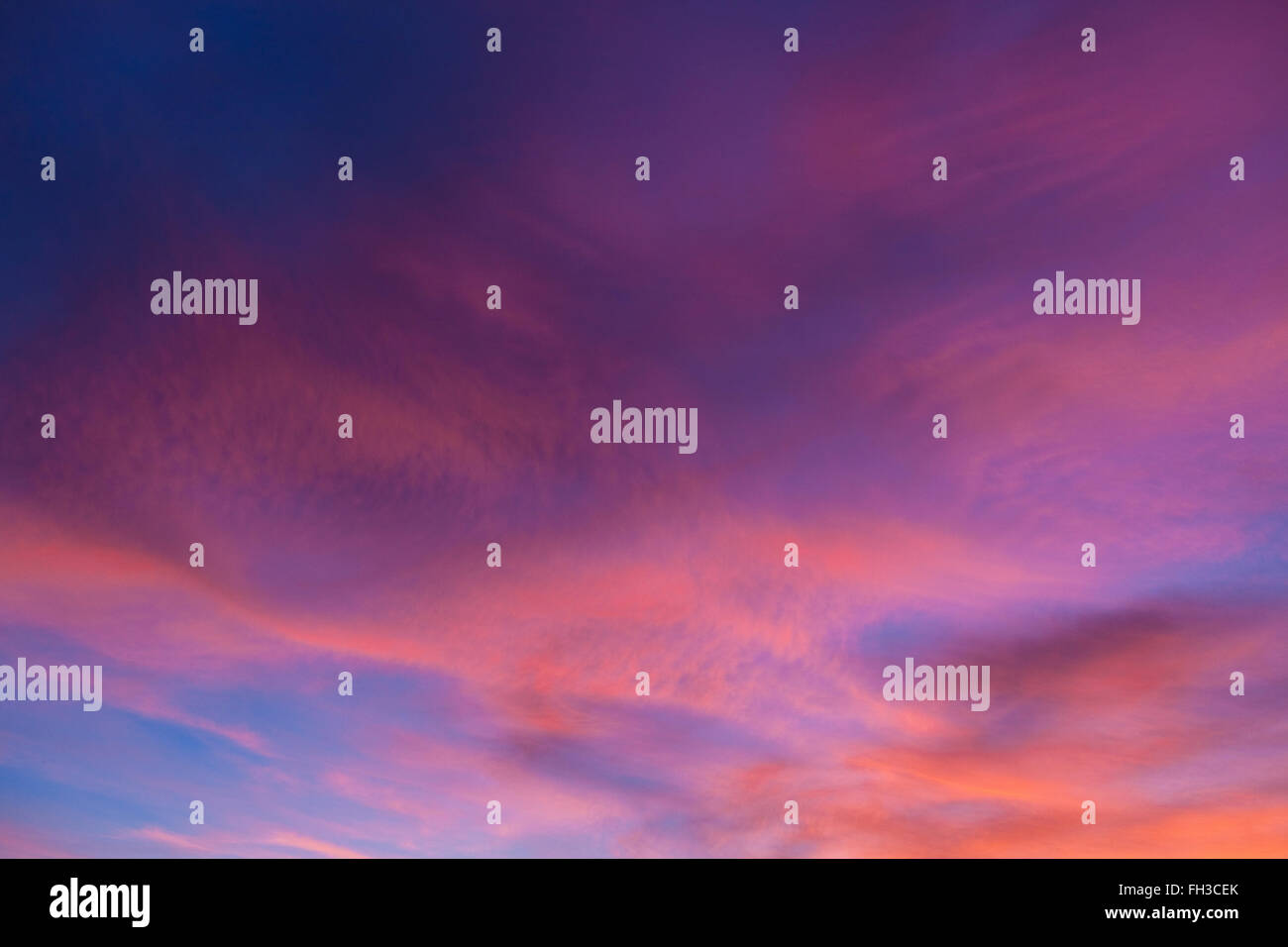 A darkening night sky as the twilight colours of red and purple fade ...