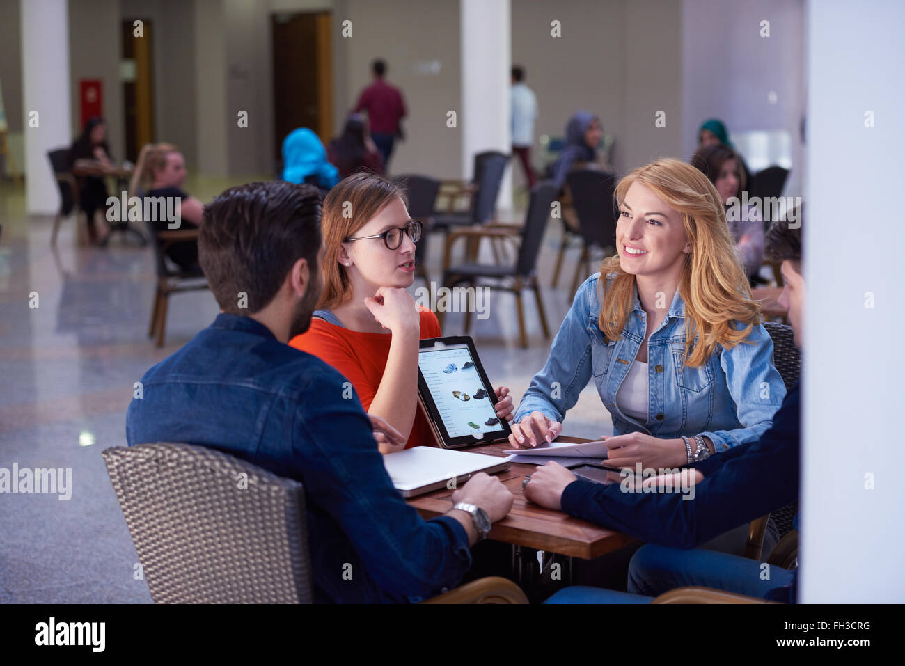 students group working on school project together Stock Photo - Alamy