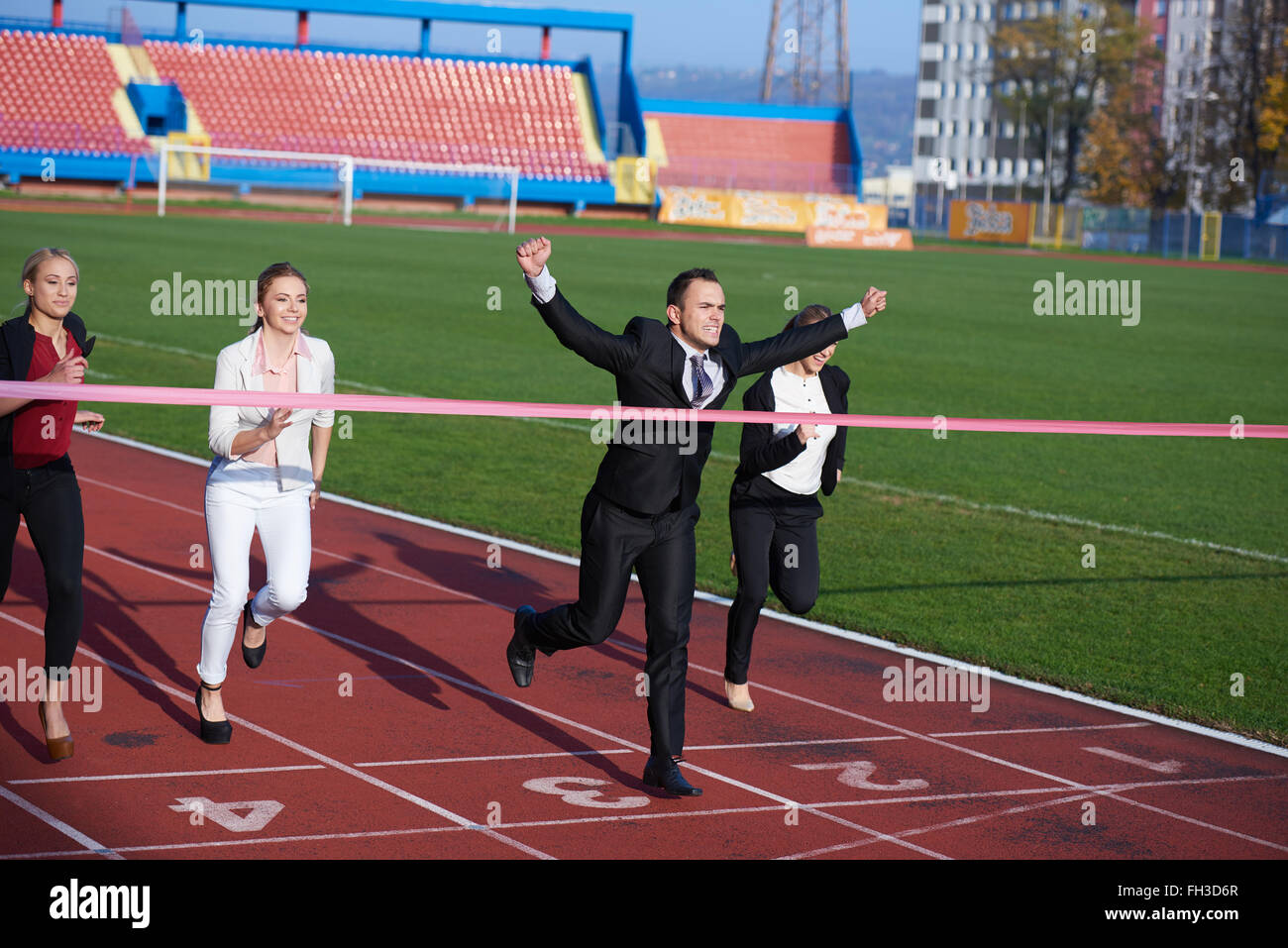 business people running on racing track Stock Photo - Alamy