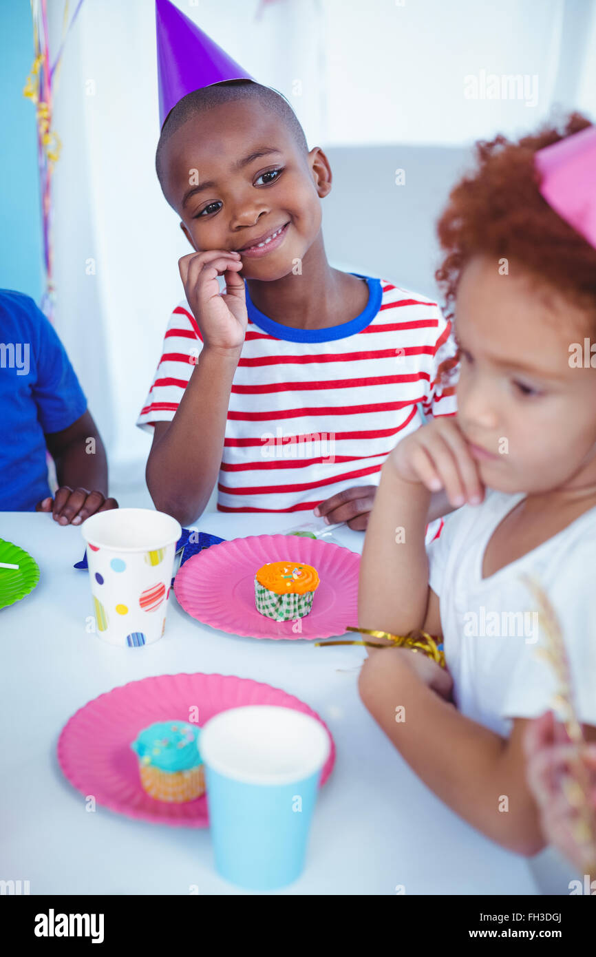 Excited kids enjoying a birthday party Stock Photo - Alamy