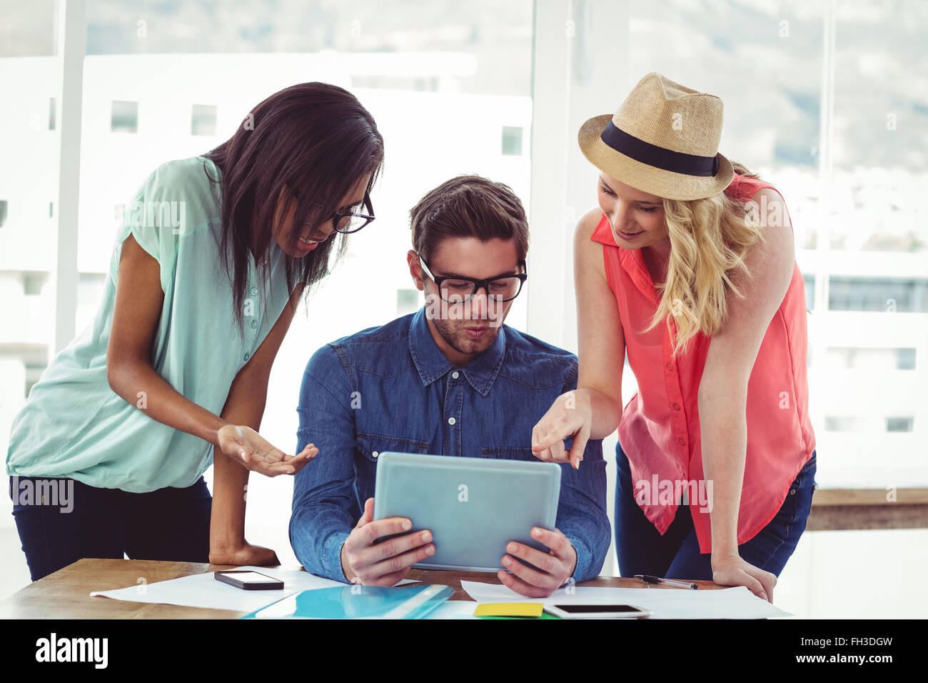Creative business team working hard together Stock Photo - Alamy