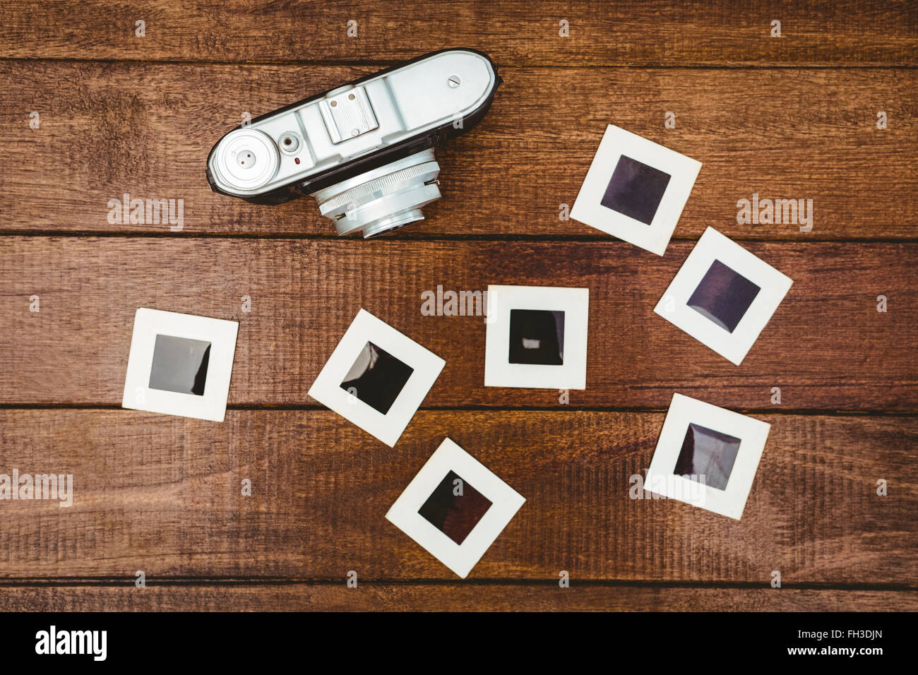 View of an old camera with photos slides Stock Photo - Alamy