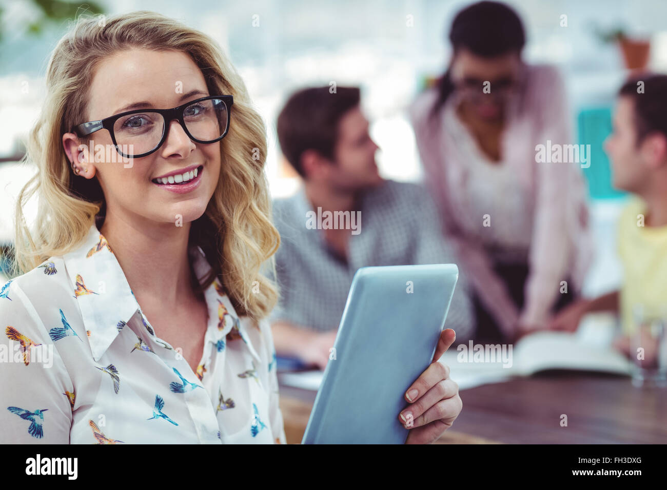 Creative business team working hard together Stock Photo - Alamy