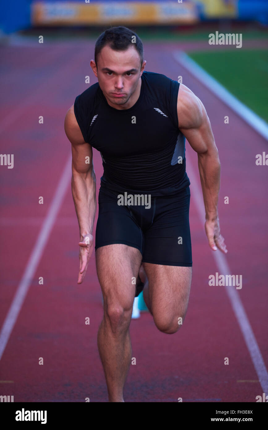 Athletic man start Stock Photo - Alamy