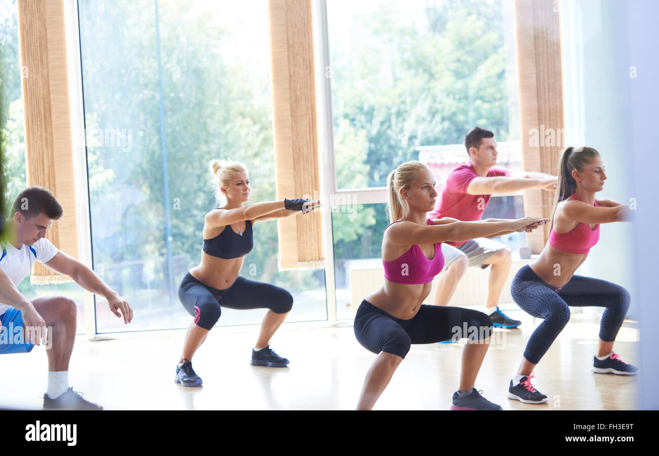 Group of people exercising at the gym Stock Photo - Alamy