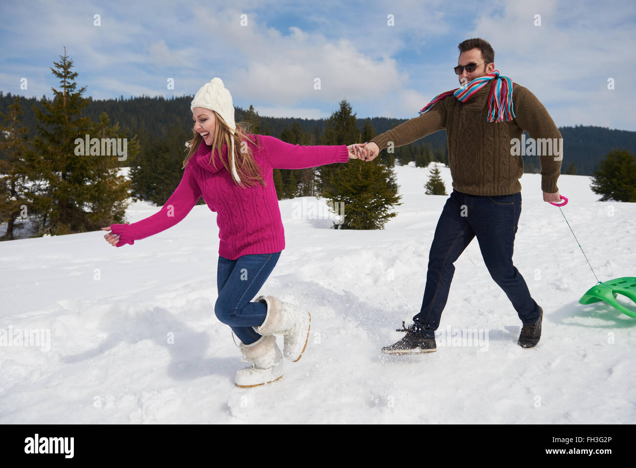 happy young couple having fun on fresh show on winter vacation Stock ...
