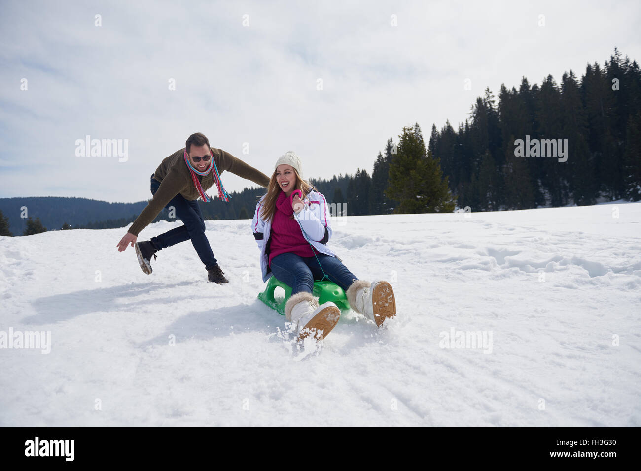 happy young couple having fun on fresh show on winter vacation Stock ...