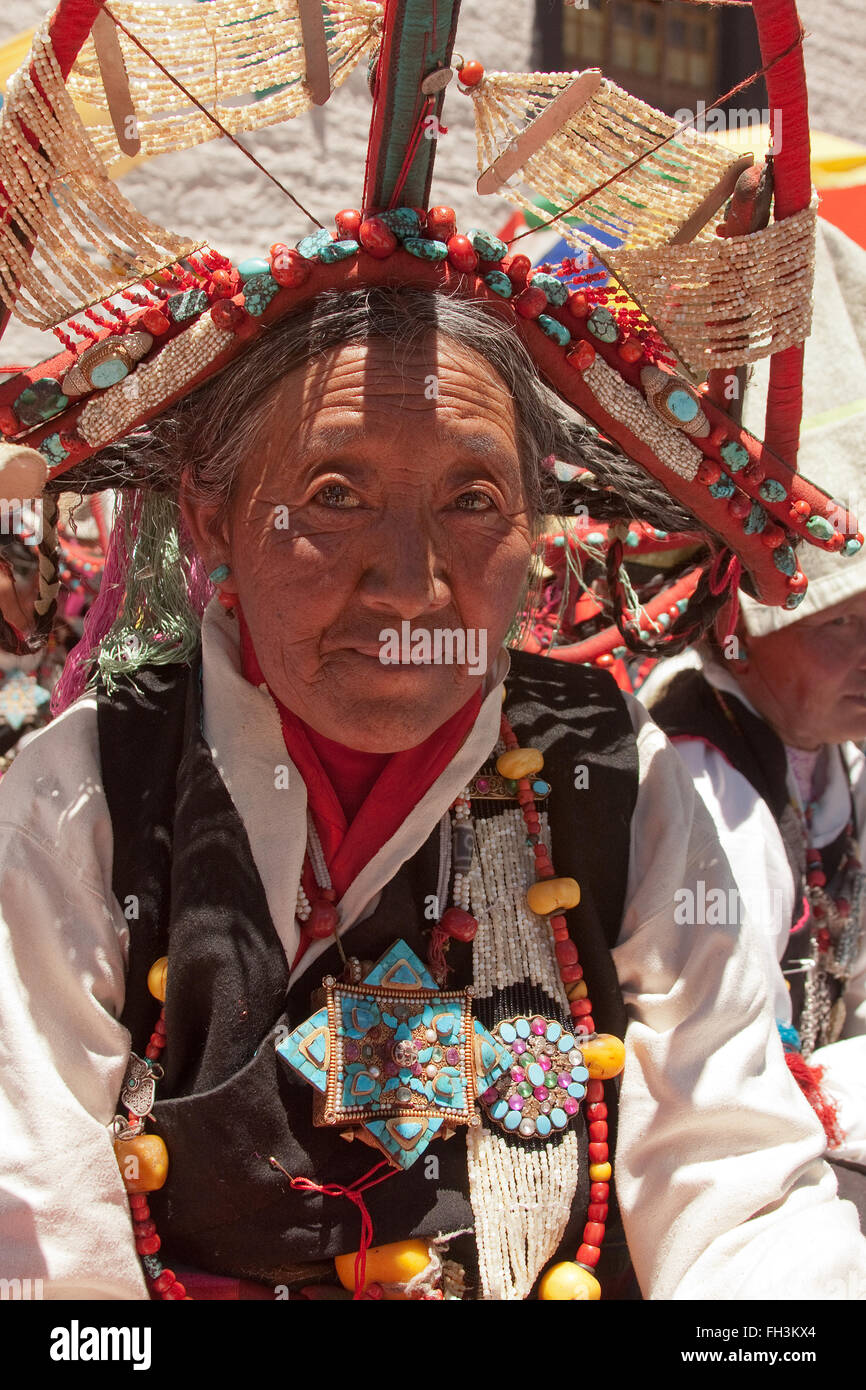 A Tibetan woman wearing full traditional headdress local costume Stock ...