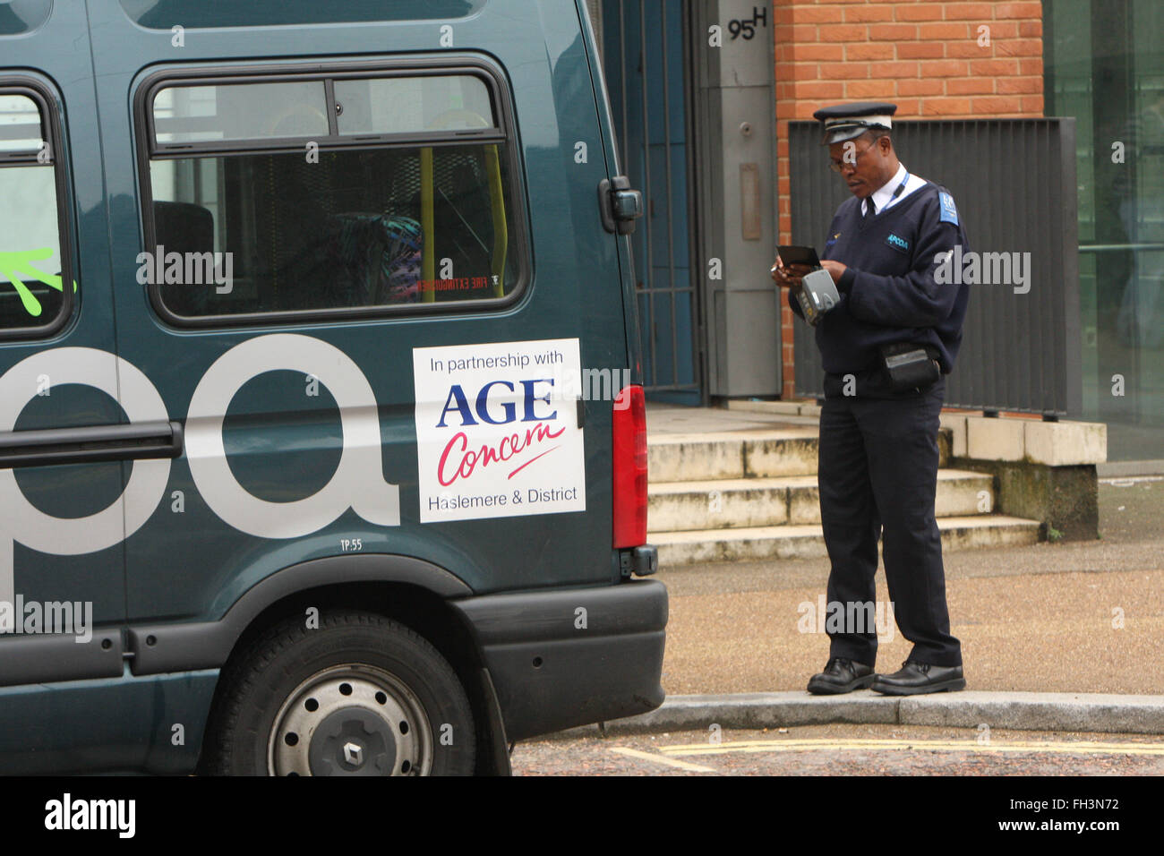 age concern mini bus gets a parking ticket (credit image © Jack Ludlam ...