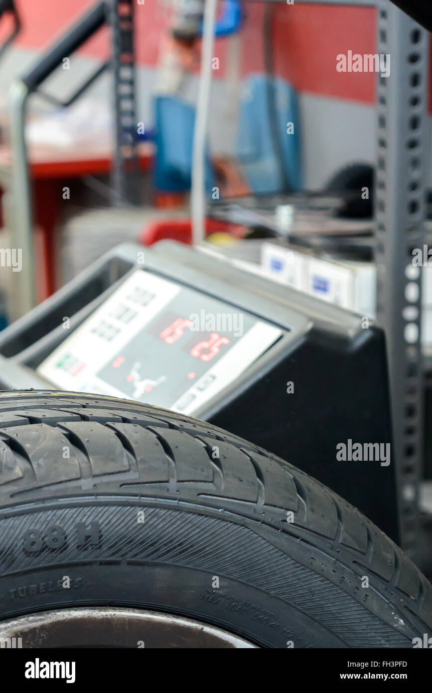 Repair mechanic working on car in garage hi-res stock photography and ...