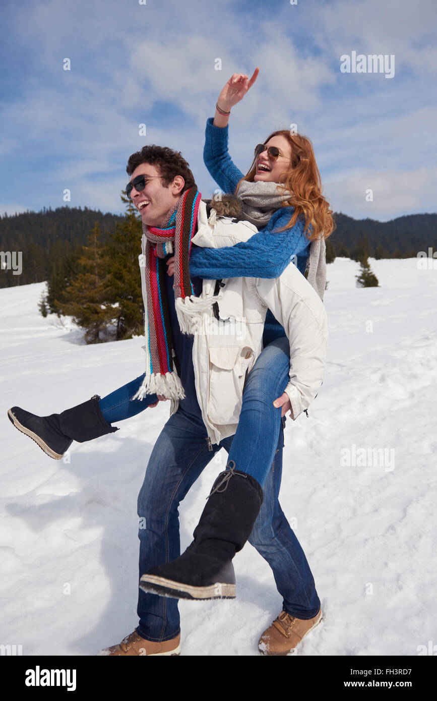 happy young couple having fun on fresh show on winter vacation Stock ...