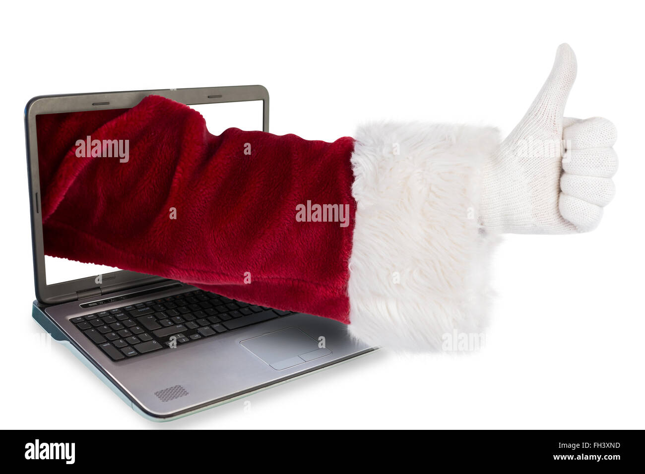 Composite image of father christmas gives a thumb up Stock Photo - Alamy