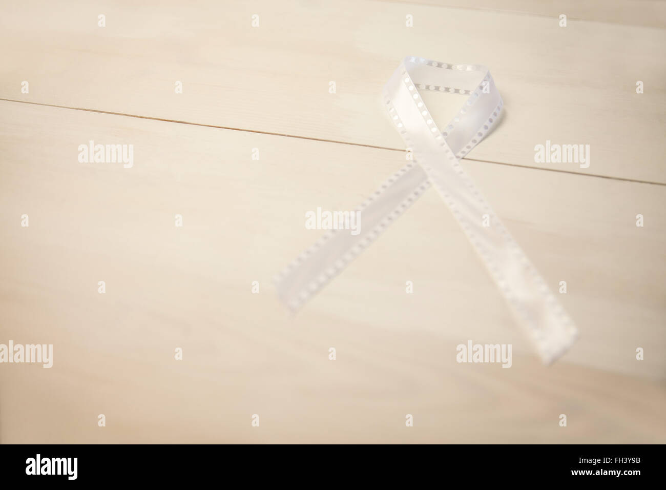 Chewing gum wrapper on wooden desk Stock Photo - Alamy