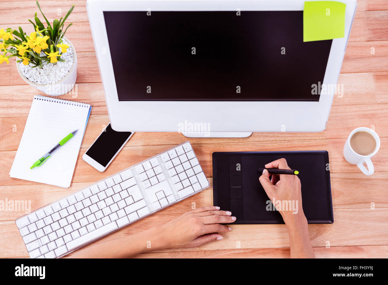 Part of hand using stylus Stock Photo - Alamy