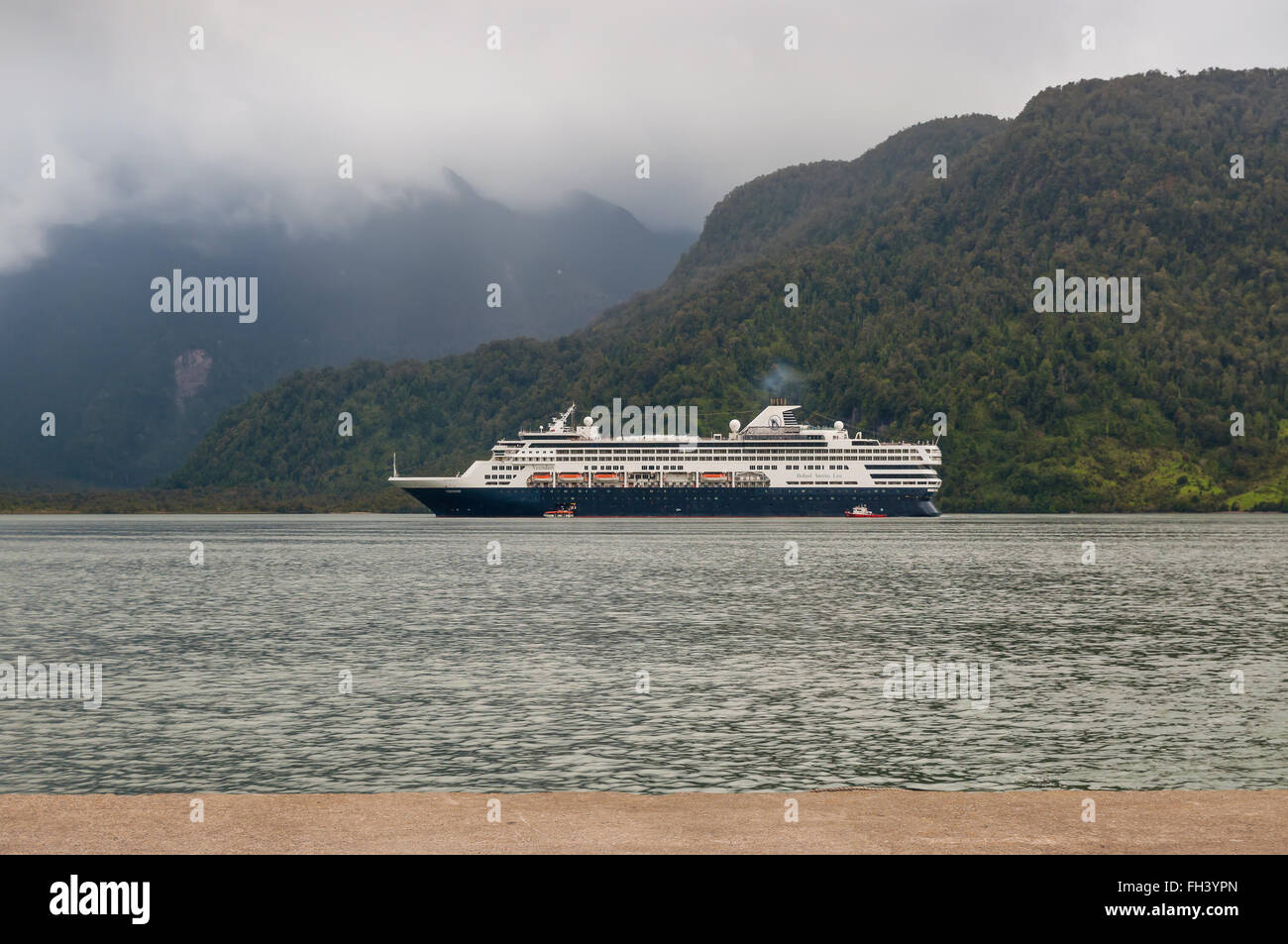 The Holland America Line cruise ship Veendam at anchor in Puerto ...