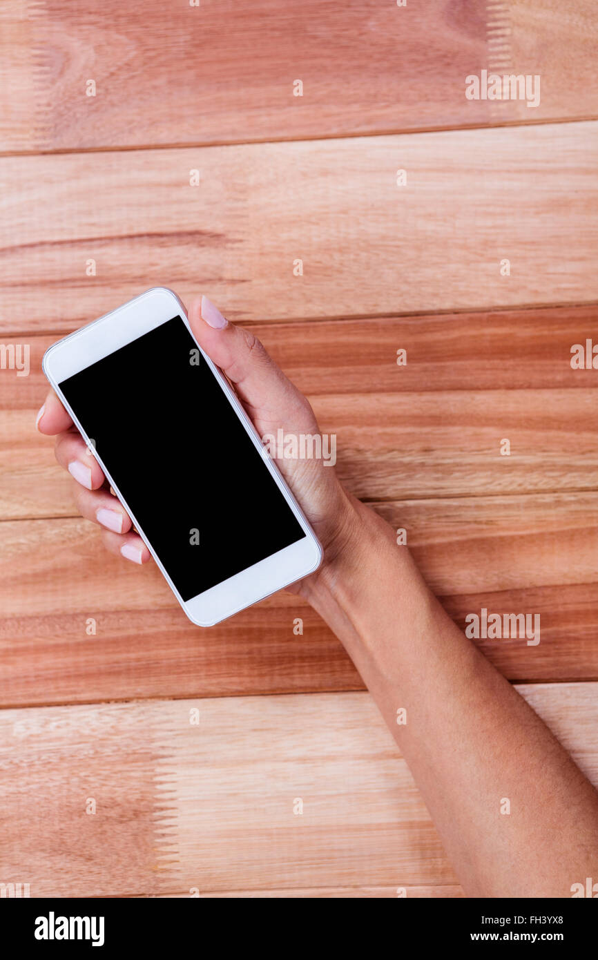 Part of hand holing smartphone Stock Photo - Alamy