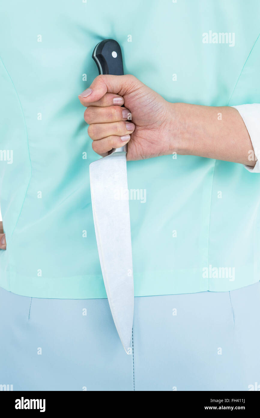 Woman Holding Knife Behind Back High Resolution Stock Photography and ...