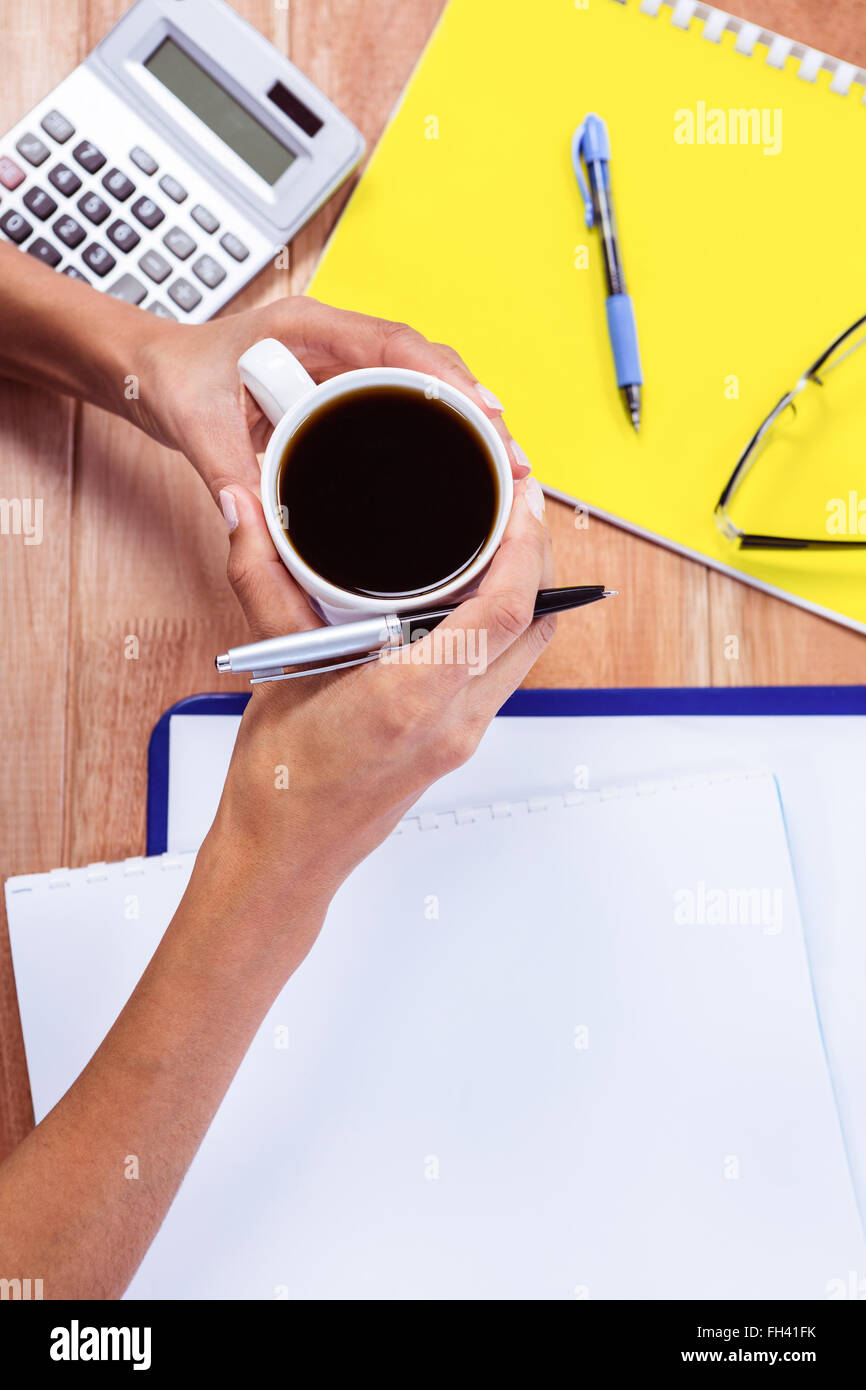 Part of hands taking notes Stock Photo - Alamy