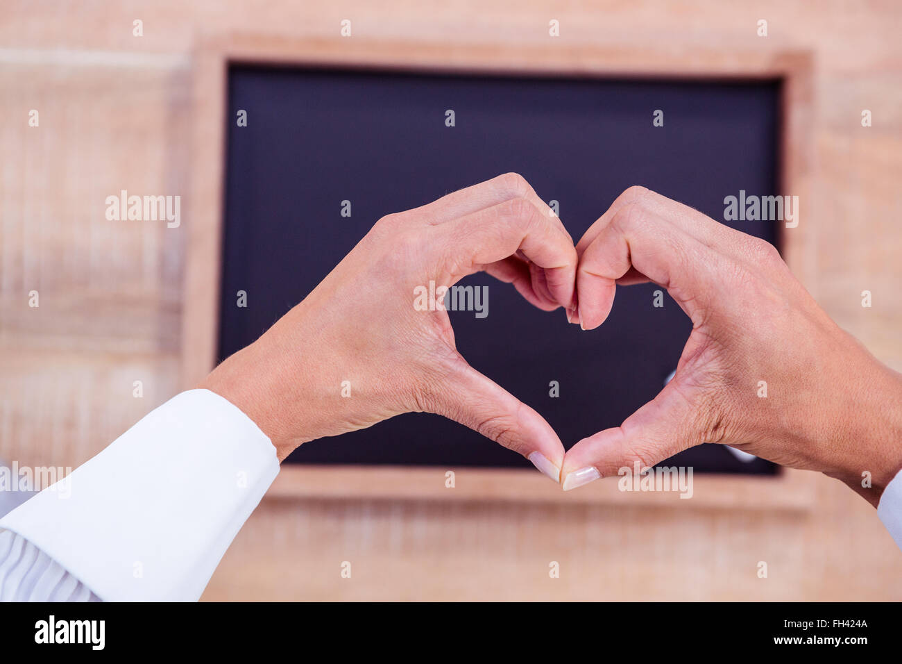Hands making heart shape Stock Photo - Alamy
