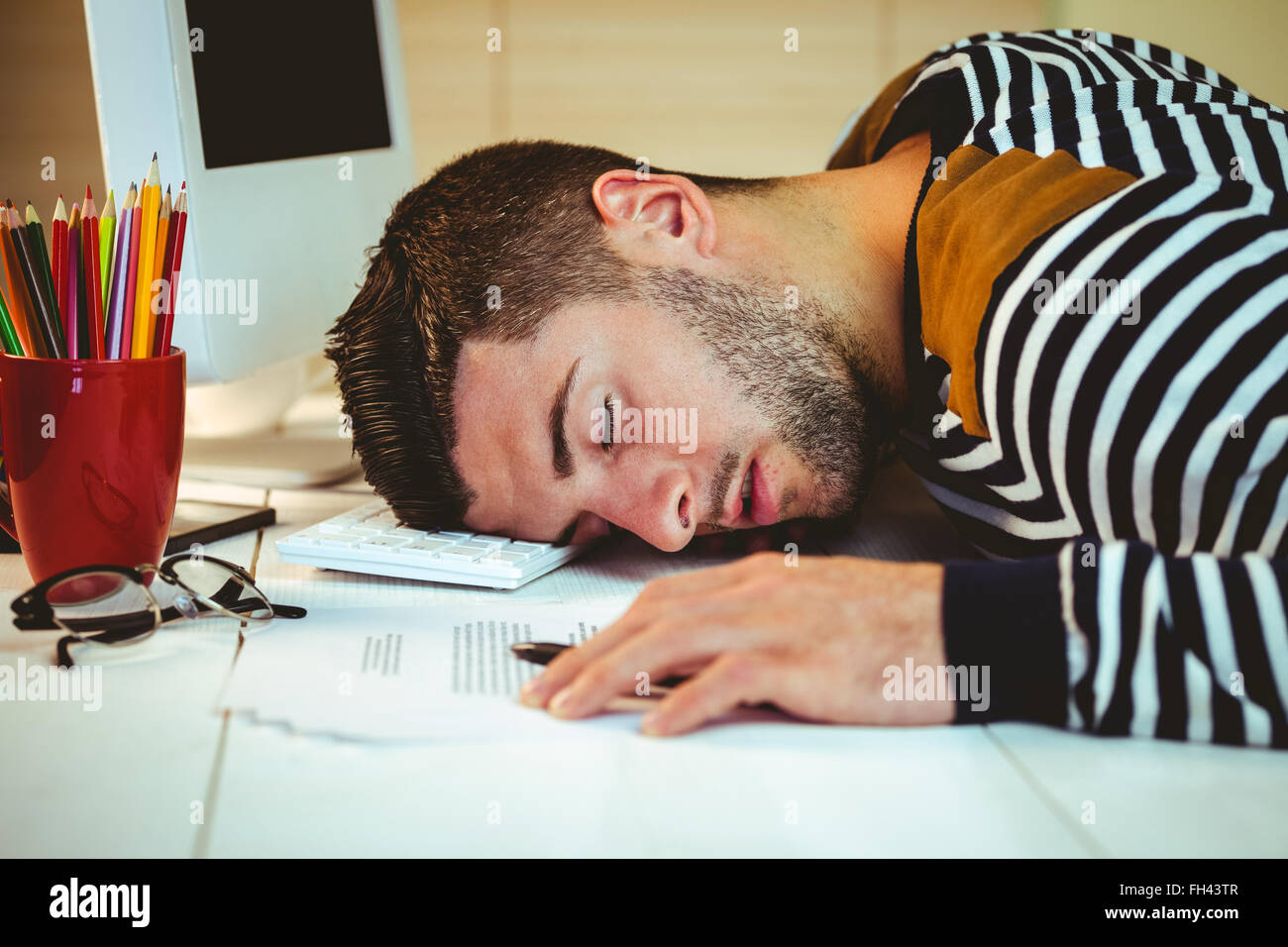 Man asleep at his desk Stock Photo - Alamy