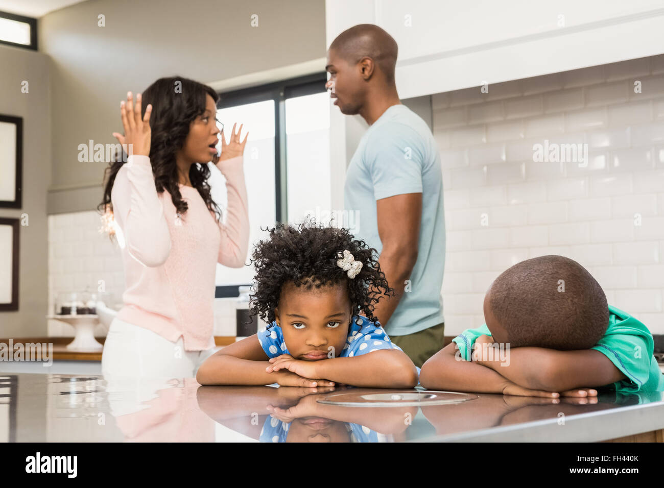 Parents arguing in front of children Stock Photo - Alamy