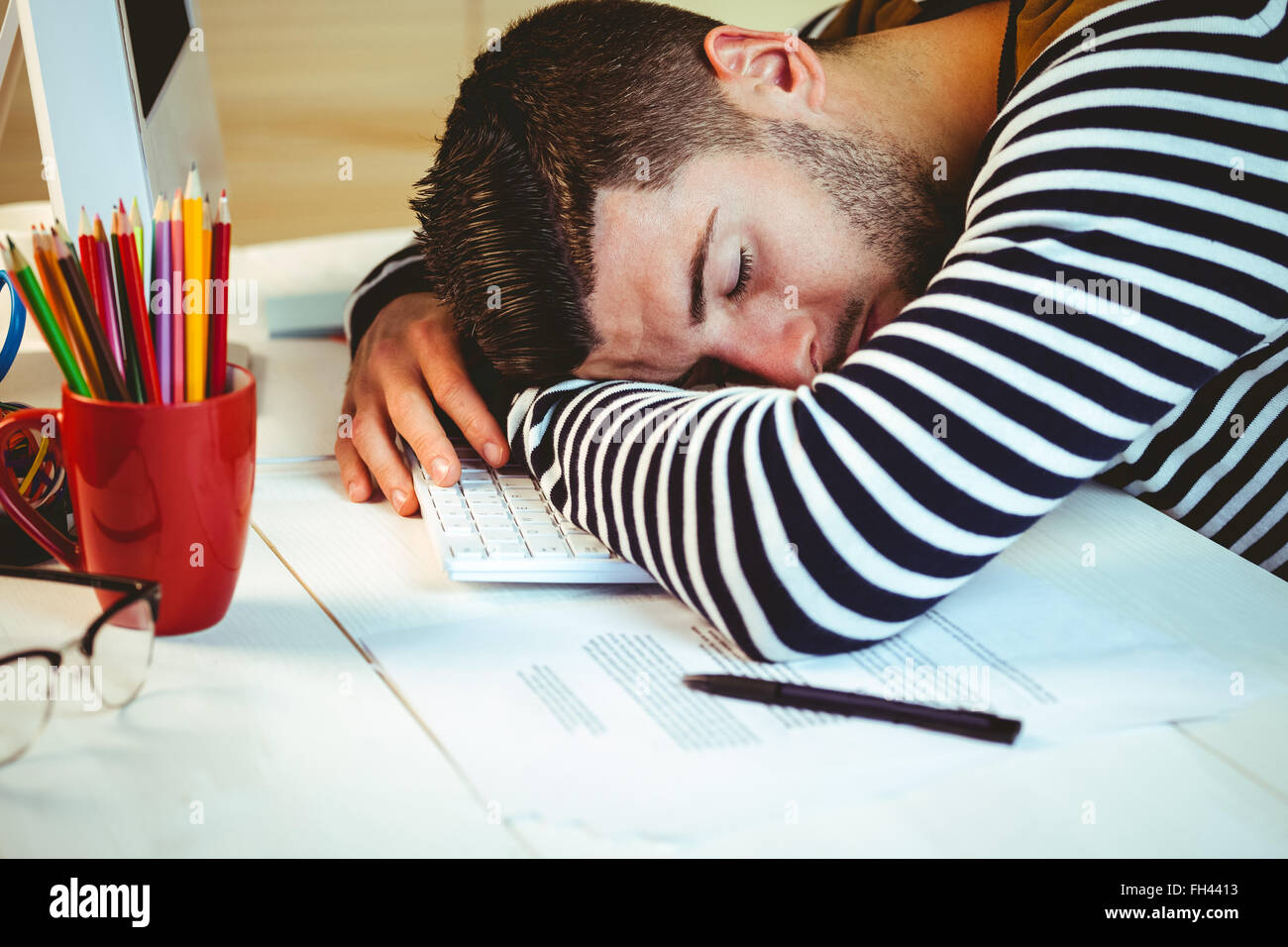 Man asleep at his desk Stock Photo - Alamy