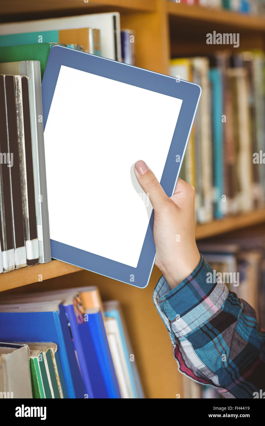 Students hand putting table in bookshelf Stock Photo - Alamy